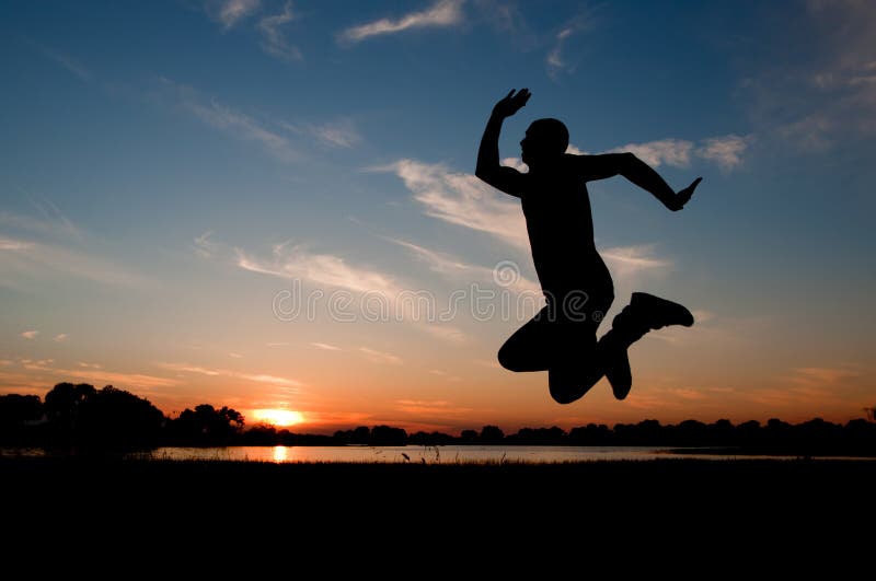 Silhouette of a Man Jumping in the Sunset Stock Image - Image of summer ...