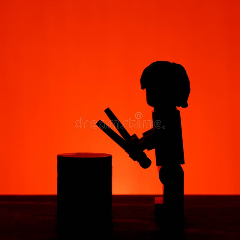 Silhouette of a Man-like Figure Playing Against a Red Background ...