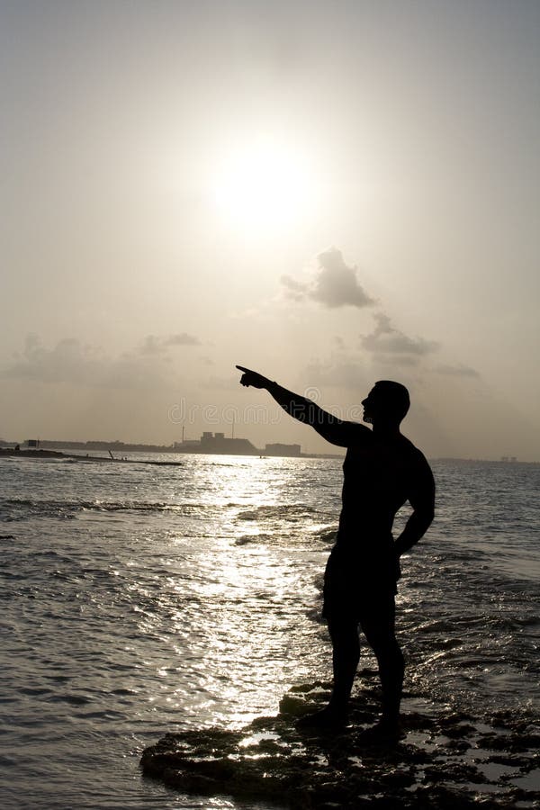 Silhouette of Man Pointing Finger in Air at Sunset Stock Image - Image ...