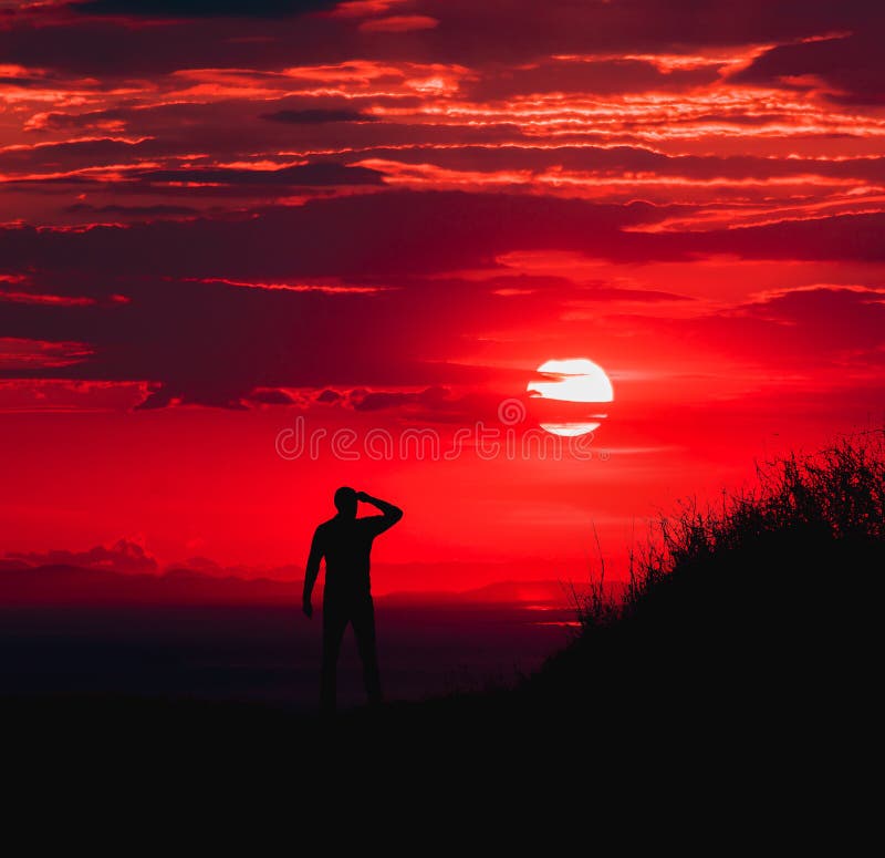 Silhouette of Man during Red Sun Stock Photo - Image of environment ...
