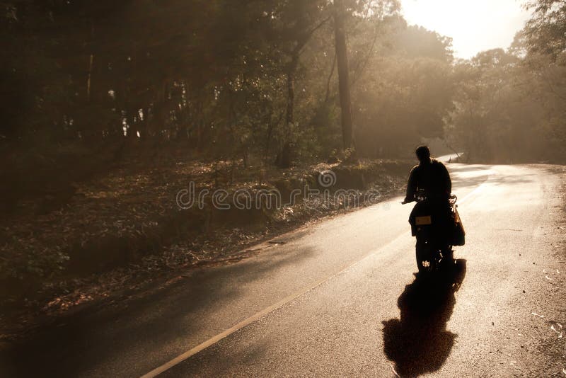 Rear View of Young Man Riding Motorcycle in Asphalt Road Curve W Stock ...