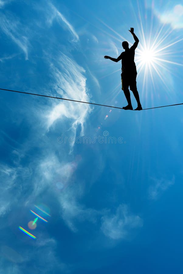 Concept of Risk Taking Man Balancing on the Rope Stock Photo - Image of ...
