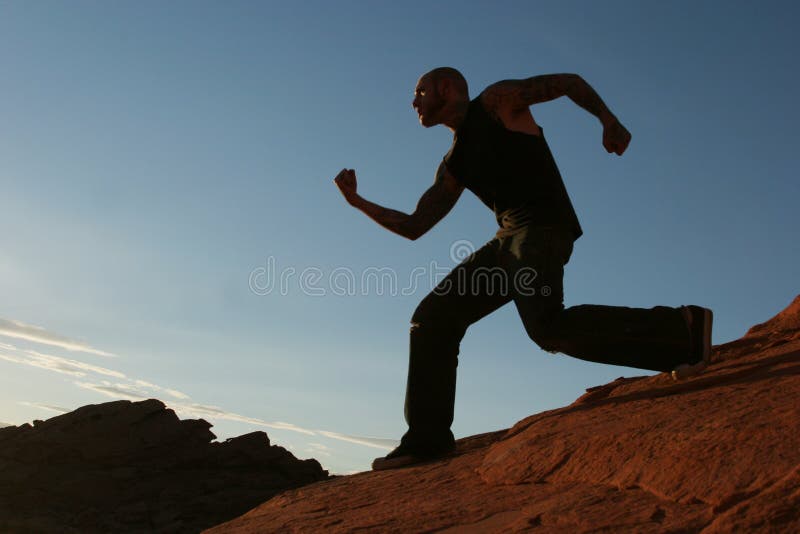 Silhouette of a Man Running Stock Image - Image of determination ...