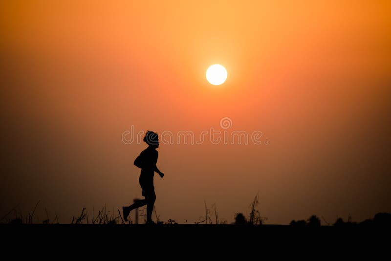 Silhouette Man Running on Sunset Background Stock Image - Image of ...