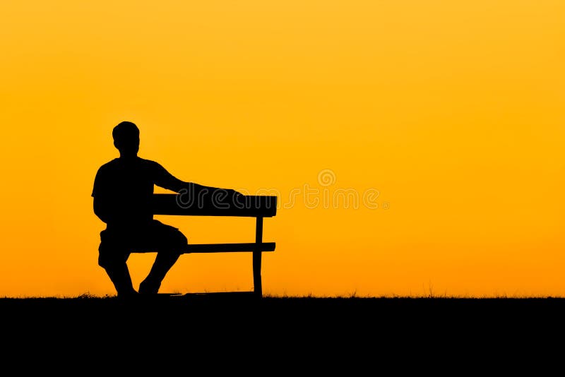 A Silhouette of Man Sitting on Bench in Sunset Stock Image - Image of ...