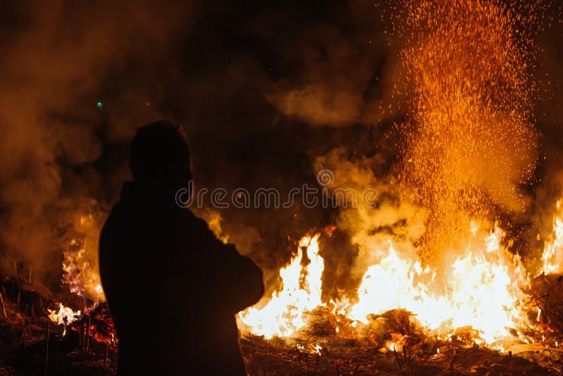 Silhouette Man Stand in Front of Fire Stock Photo - Image of fire ...