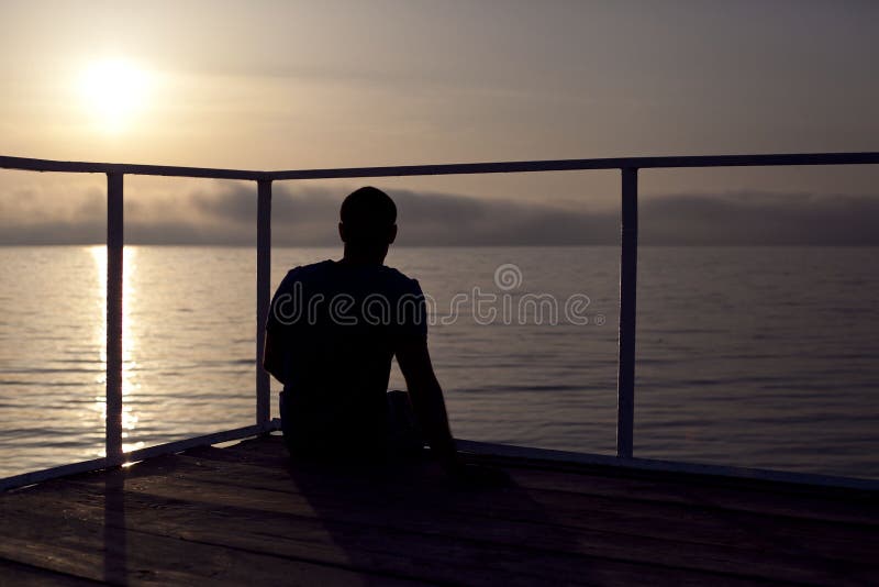 Silhouette of a Man at Sunset by the Sea Stock Image - Image of male ...