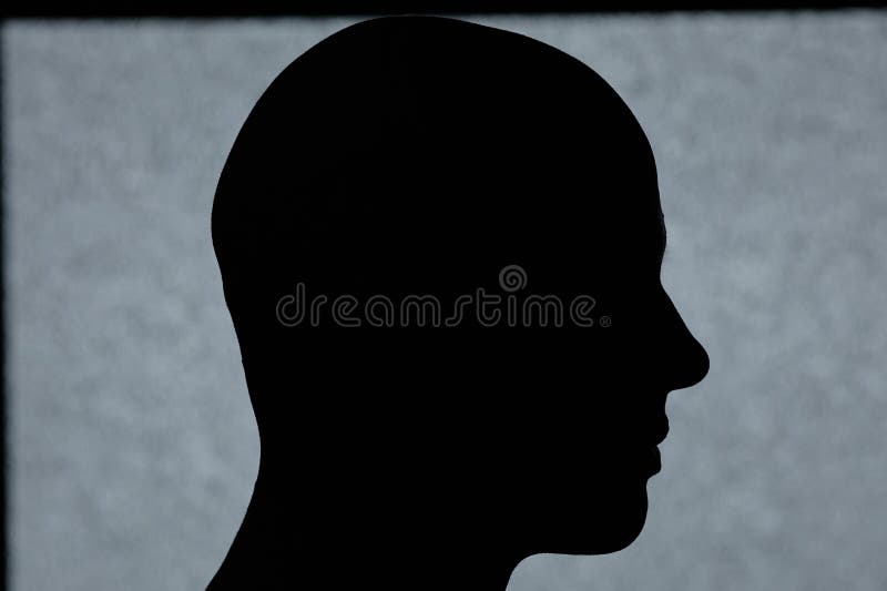 Silhouette of Mans Head Against Grey Background in Studio Stock Photo ...