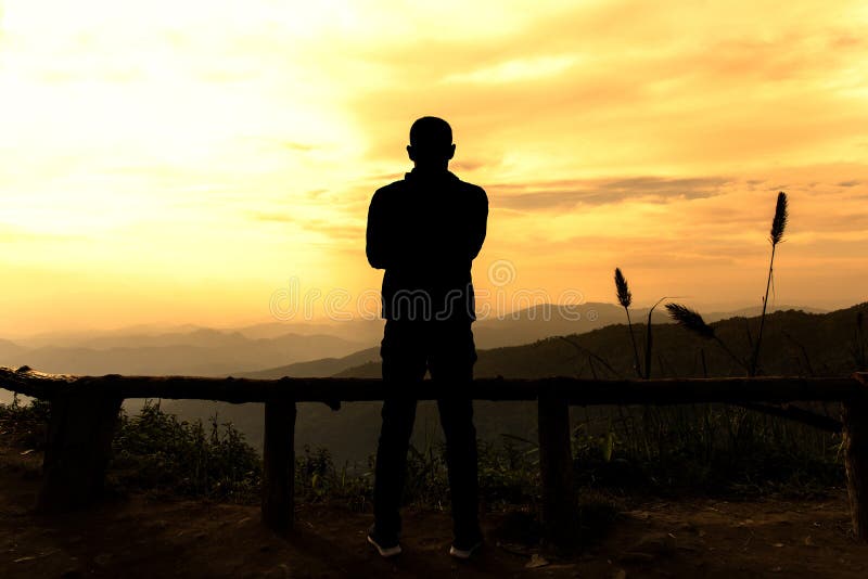 Silhouette Men Standing Back on the View Point in the Evening. Stock ...