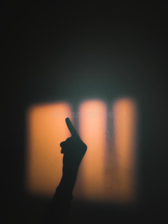 Silhouette of Middle Finger Stock Photo - Image of night, middle: 207179100