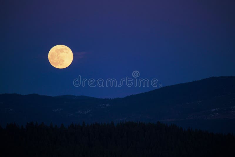 Silhouette of Montana Hills Under the Full Moon Stock Photo - Image of ...