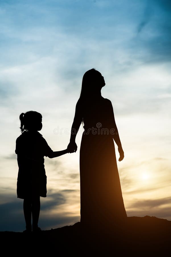 Silhouette of Mother with Her Daughter Standing Stock Photo - Image of ...