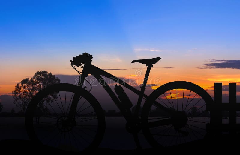Sunset with mountain bike. stock photo. Image of lifestyle - 98329806