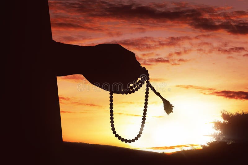 Silhouette of Muslim Man in Ihram Clothes Standing and Praying while ... Silhouette of Muslim Man in Ihram Clothes Standing and Praying while ...