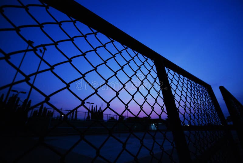Silhouette of Net Wall in Morning on Blue Sky Background Stock Photo ...