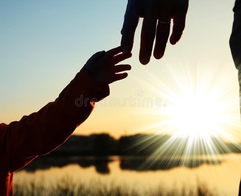 Silhouette Parent and Child Hands Stock Image - Image of giving ...
