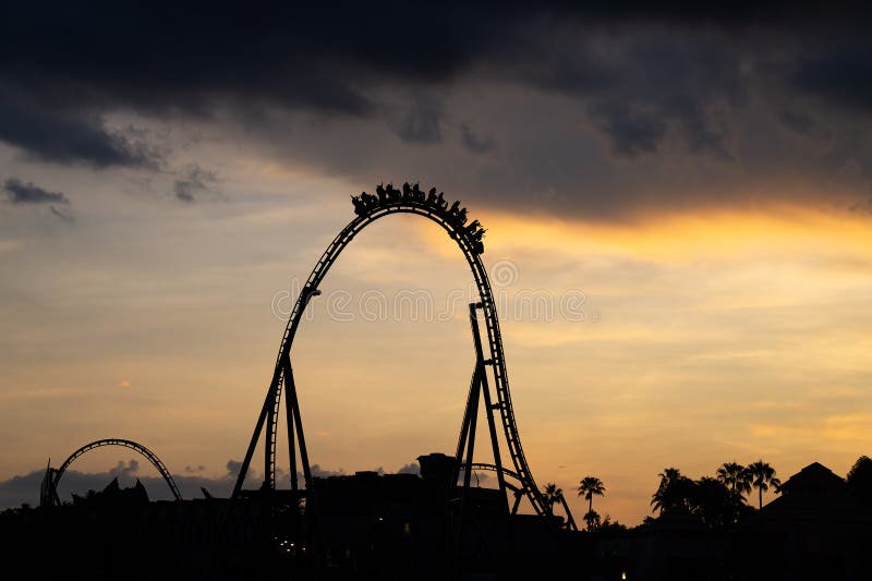 A Roller Coaster at Sunset Time Stock Photo - Image of sunset, speed ...