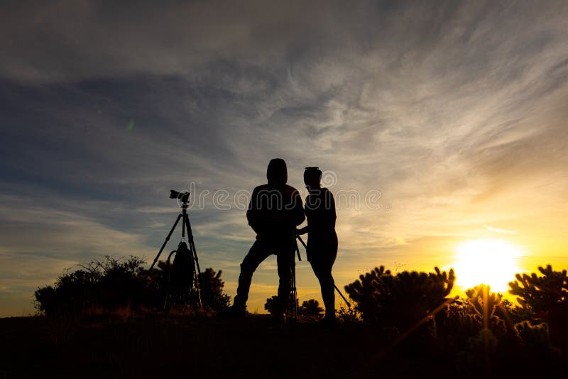Silhouette of People Setting Tripods To Shoot the Sunset Stock Image ...