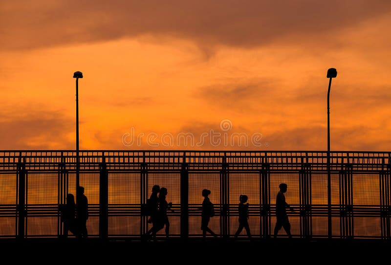 Silhouette of People Walking on Overpass Stock Image - Image of detail ...