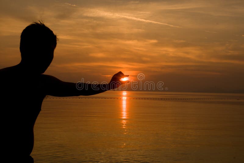 Silhouette of a Person Catching the Sun Stock Photo - Image of cloud ...