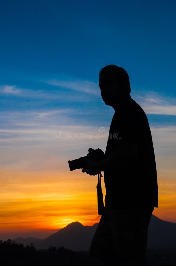 Capture the Sunset View with a DSLR Camera Standing on Standby Stock ...