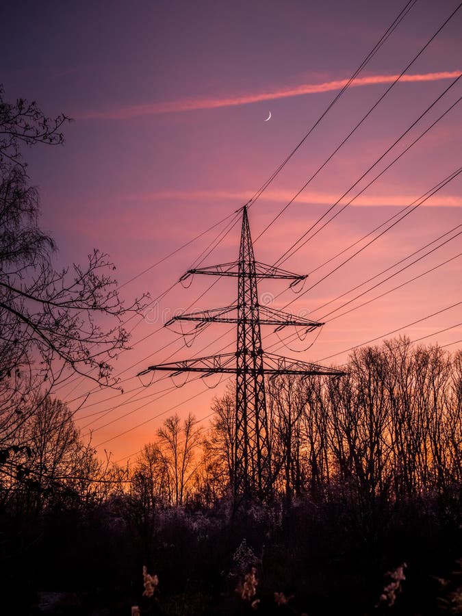 Silhouette of Poles and Power Lines in the Sunset Stock Image - Image ...