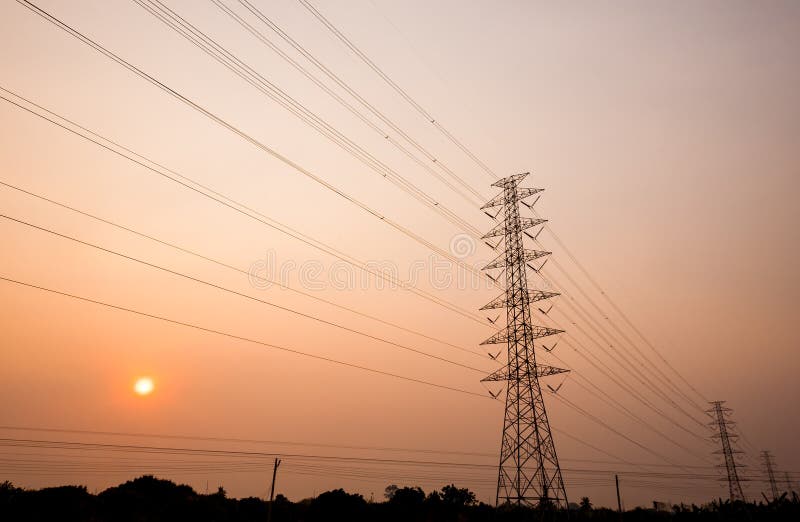 Electricity Pylon and Sunset Stock Photo - Image of technology, water ...