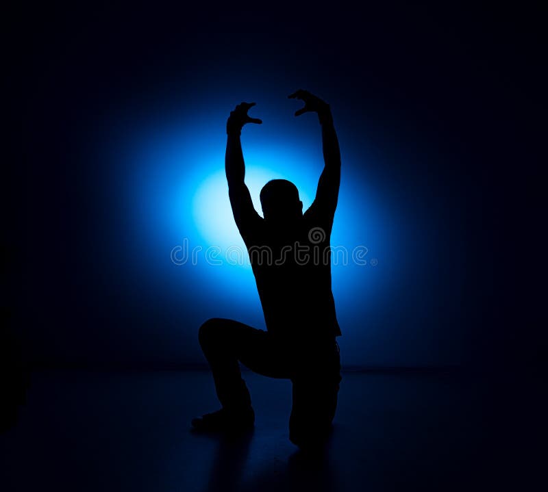 Silhouette Rocker Man Posing on Blue Background Stock Photo - Image of ...
