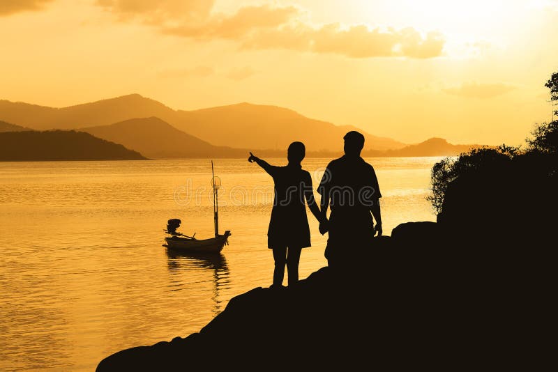 Silhouette of Man Fat Standing at Sunset Stock Photo - Image of care ...