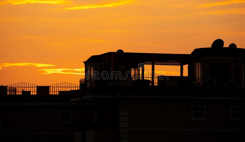 Silhouette of the Roof of the House on the Background of the Sunset ...