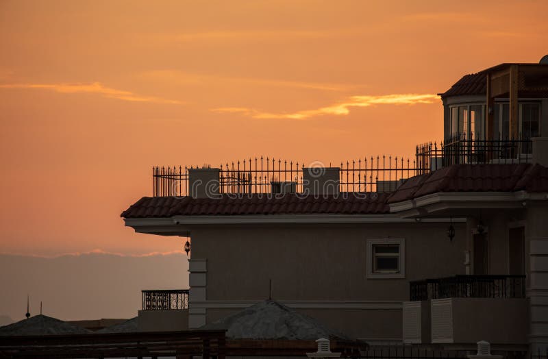 Silhouette of a House Roof at Sunset Stock Photo - Image of outdoor ...