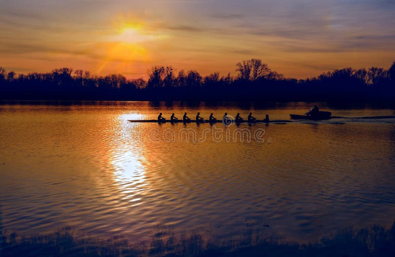 Silhouette of Row Boat Against Sunset on the Lake Stock Image - Image ...
