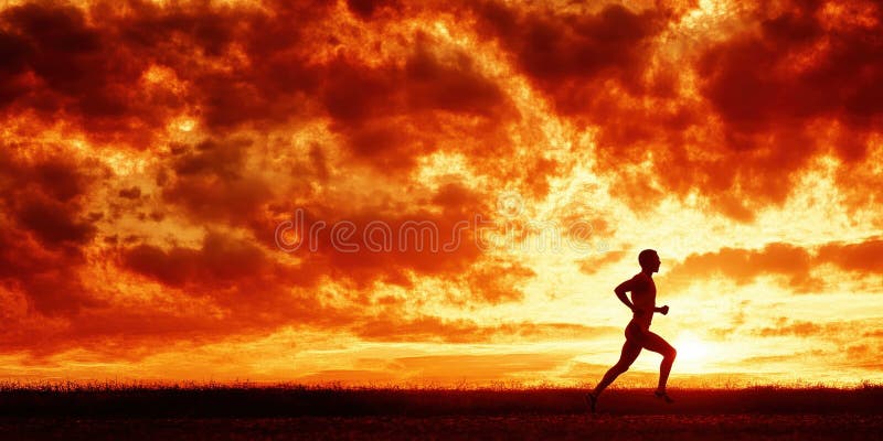 Silhouette of Runner Against Dramatic Sunset Sky with Fiery Clouds and ...