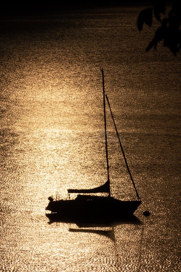 Silhouette of a Sailing Boat Floating on a Lake Stock Photo - Image of ...