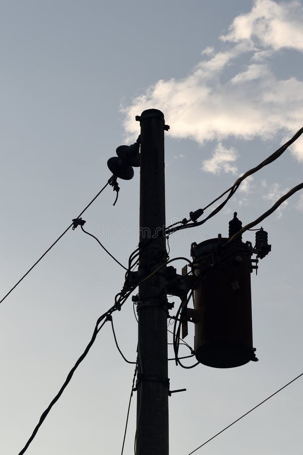 Silhouette of Single Phase Transformer on an Electric Pole Stock Photo ...