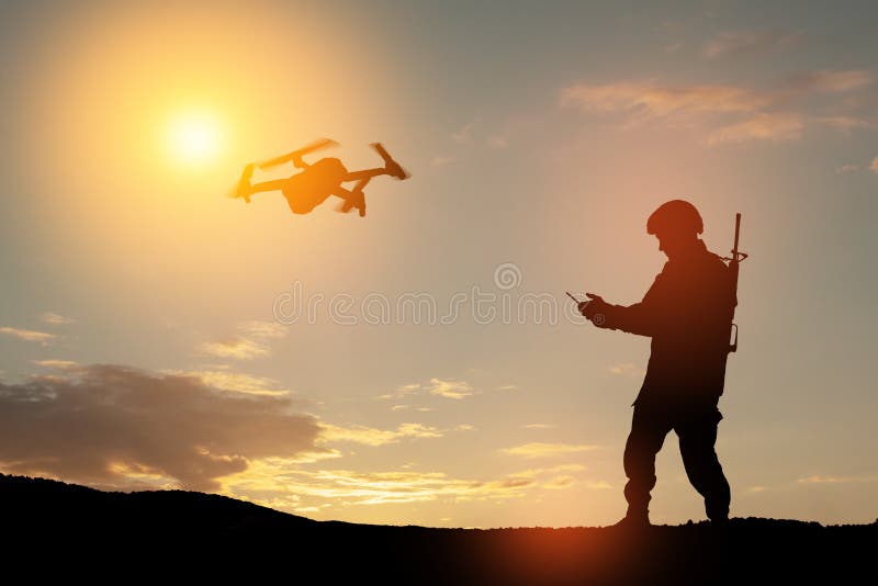 Silhouette of Soldier are Using Drone and Laptop Computer for Scouting ...