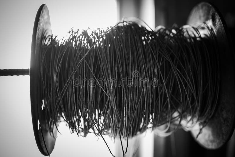 Silhouette Spool of Thick Wire on a Spindle. Stock Image - Image of ...