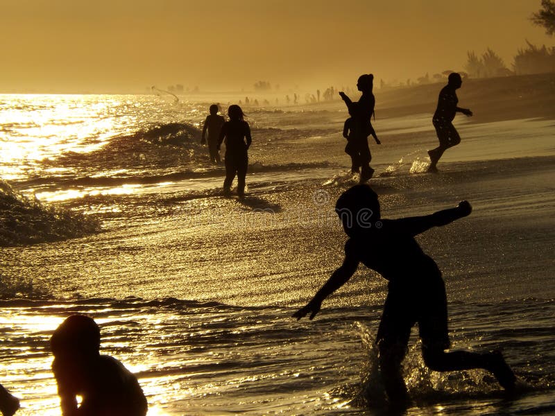 Silhouette Summer People Having Fun at the Beach Sunset Stock Image ...