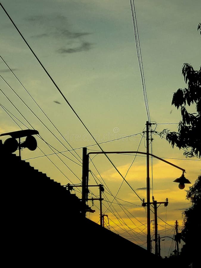 The Silhouette of the Sun on the Narrow Street at Sunset Stock Image ...