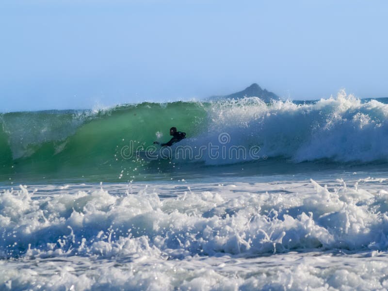 Silhouette of Surfer in Curl of Wave Stock Photo - Image of ...