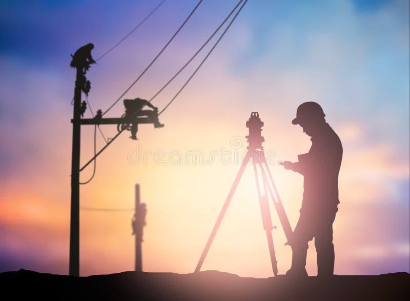 Silhouette Survey Engineer Working in a Building Site Over Blur Stock ...