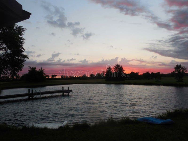 Country Sunset by the Pond stock photo. Image of silhouette - 122413518