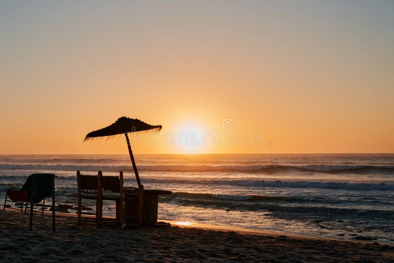 Table at the beach stock photo. Image of shore, dawn - 272183232