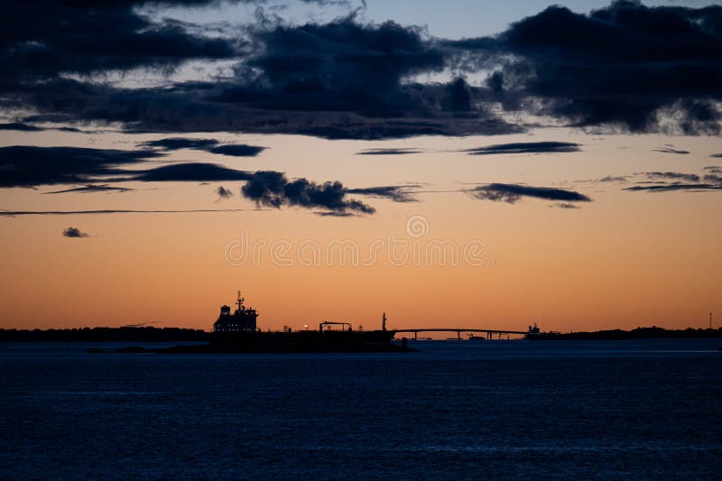 Silhouette of Tanker Ships and a Bridge in Sunset Light.. Stock Photo ...