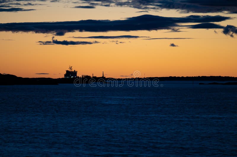 Silhouette of Tanker Ships in Sunset Light.. Stock Image - Image of ...