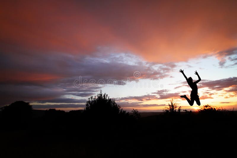 Teen Jumping in Sunset for Fun Stock Image - Image of sunset, celebrate ...