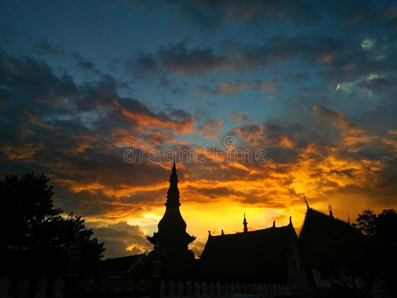 Silhouette of Temple View with Sunset Stock Photo - Image of skyline ...