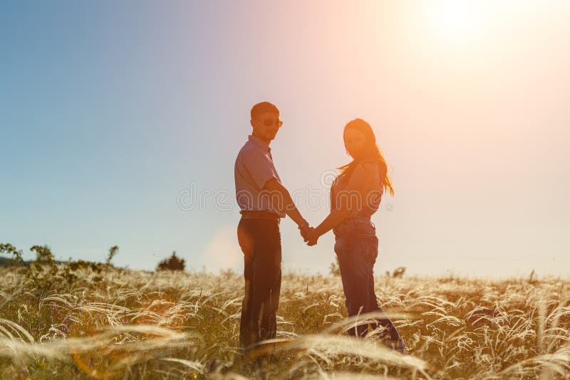 Lovers and sunset stock image. Image of orange, trip, landscapes - 72405
