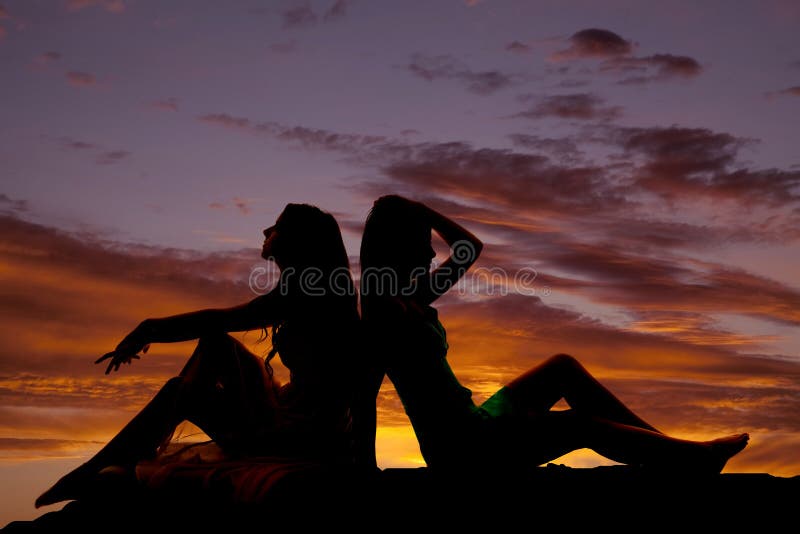 Silhouette Two Women Sit Back To Back Stock Photo - Image of gorgeous ...