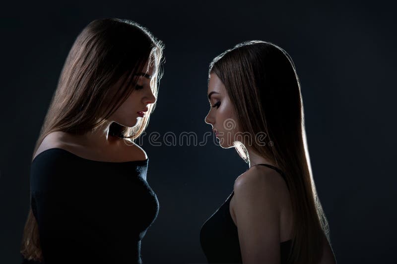 Silhouette of Two Young Girls Sisters, Backlit Stock Image - Image of ... Silhouette of Two Young Girls Sisters, Backlit Stock Image - Image of ...